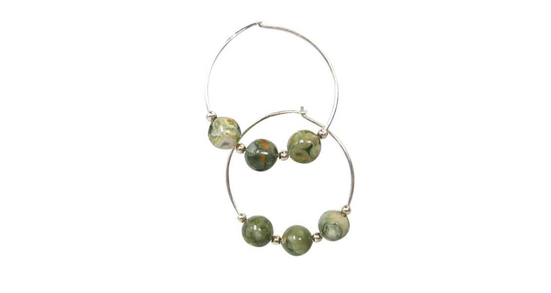 The Fascinating History Of Hoop Earrings – Earth Song Jewelry